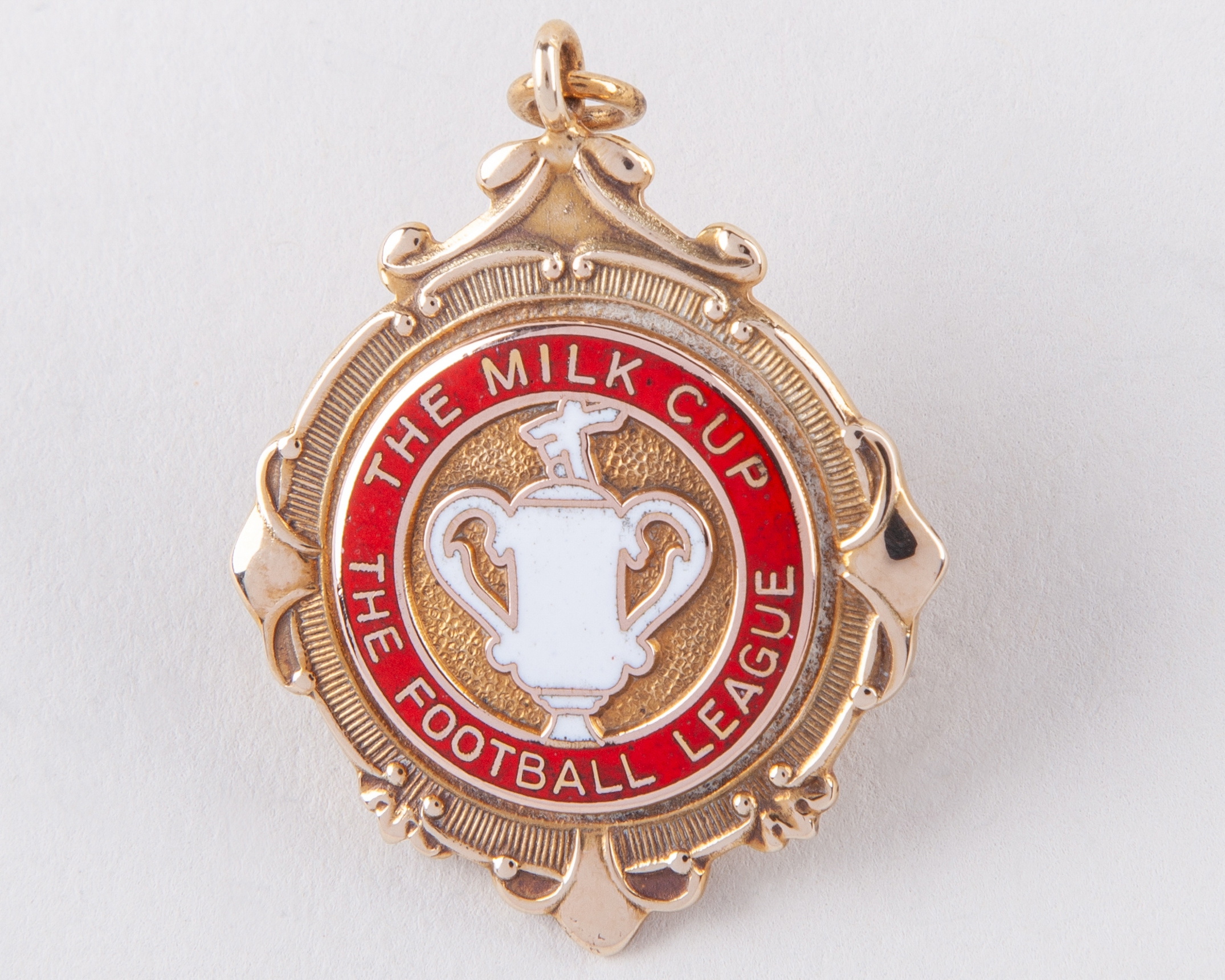 Sammy Lee a 9ct gold and enamel Liverpool v. Manchester United League ...