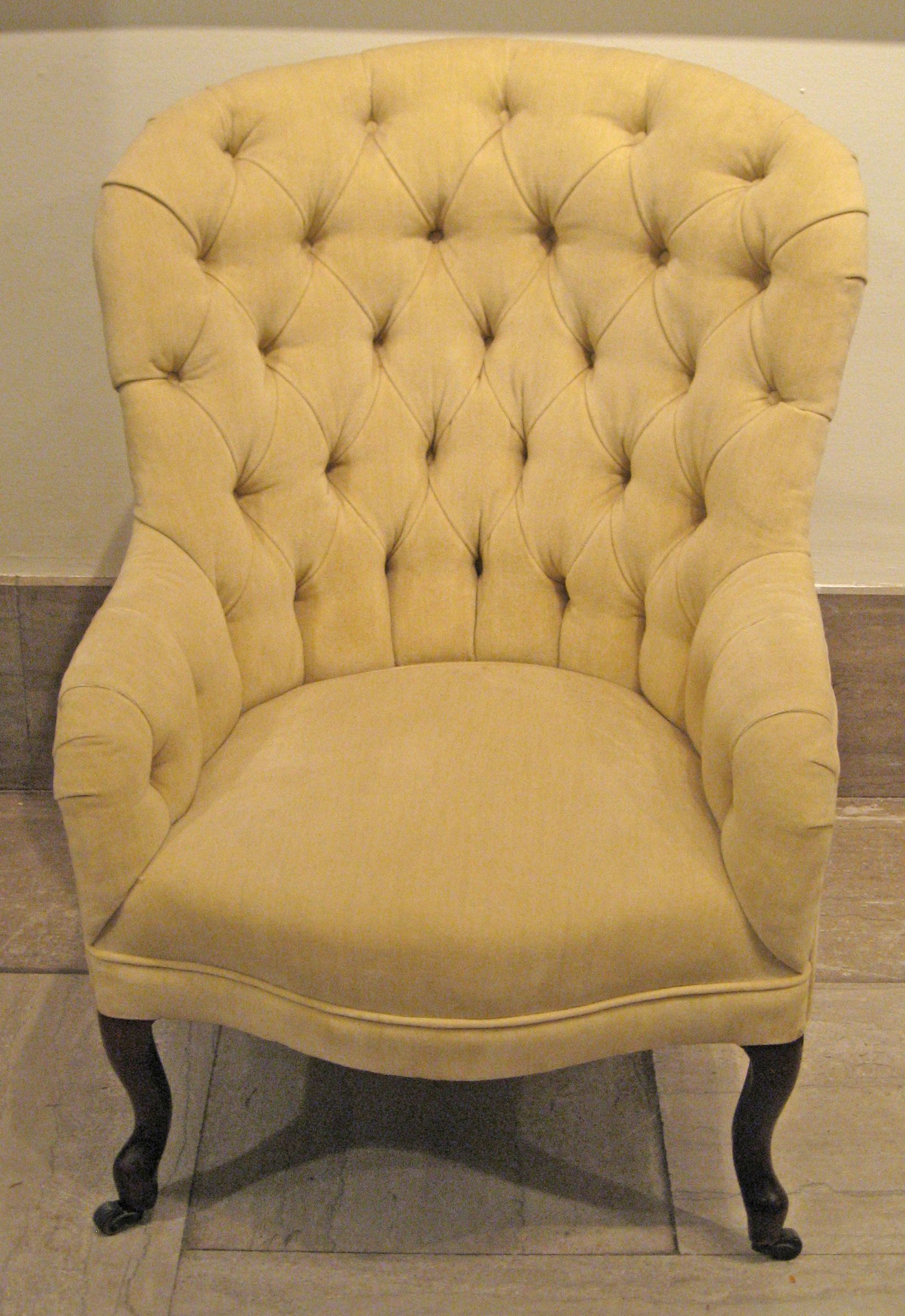 Tufted Rococo Revival arm chair | April 20, 2010